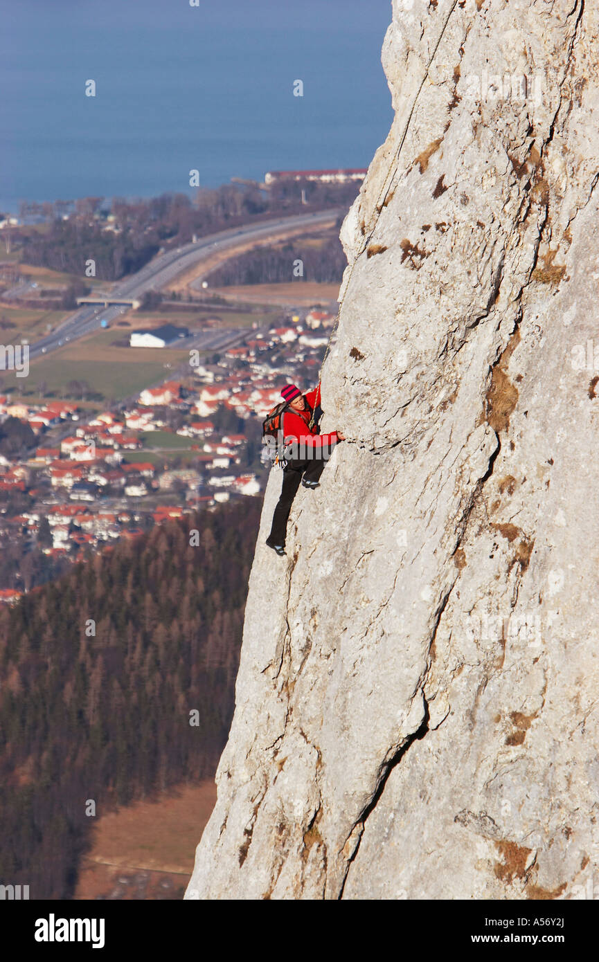 Germany, Bavaria, man climbing on rock face, side view Stock Photo - Alamy