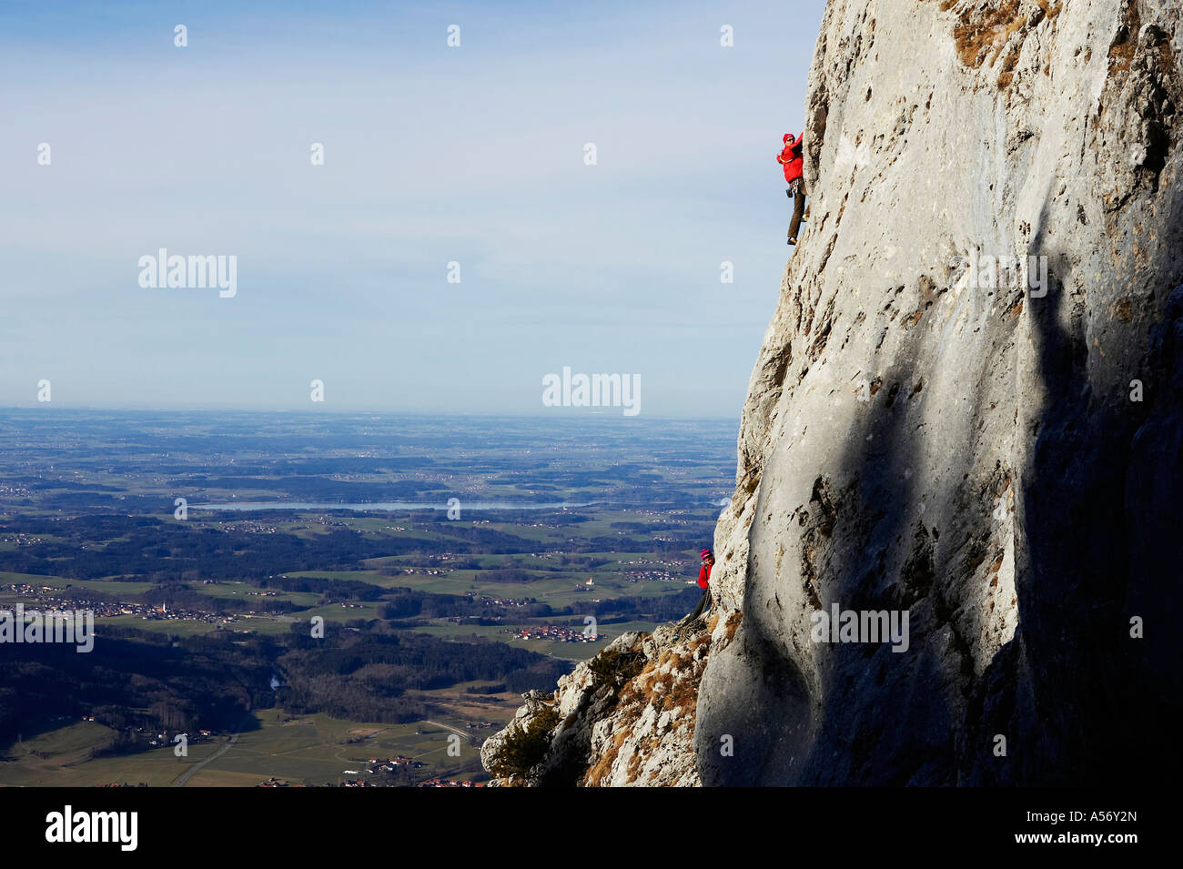 Friends climbing over rocks hi-res stock photography and images - Alamy
