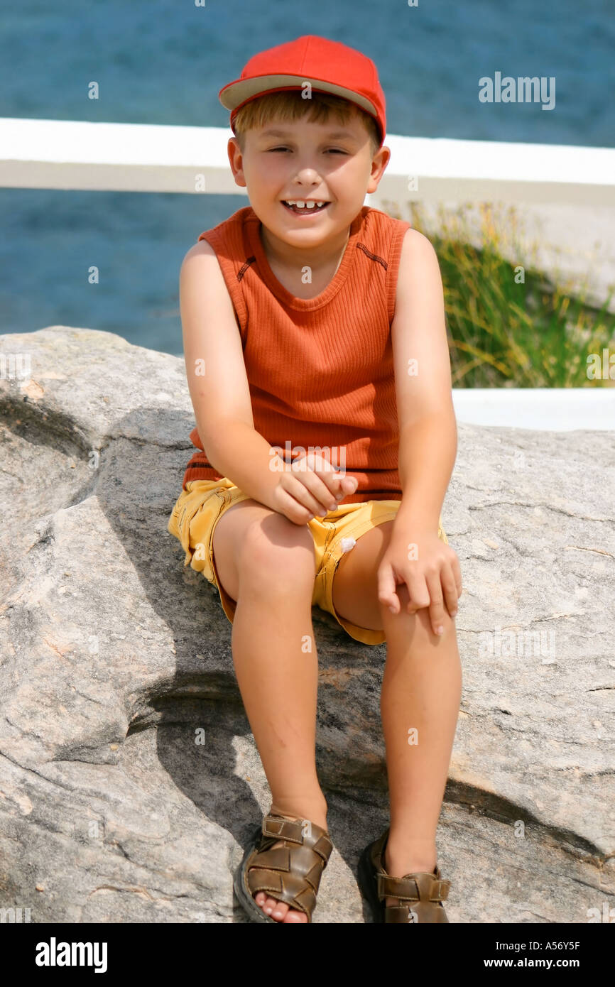 Sunny boy by the seaside Stock Photo - Alamy