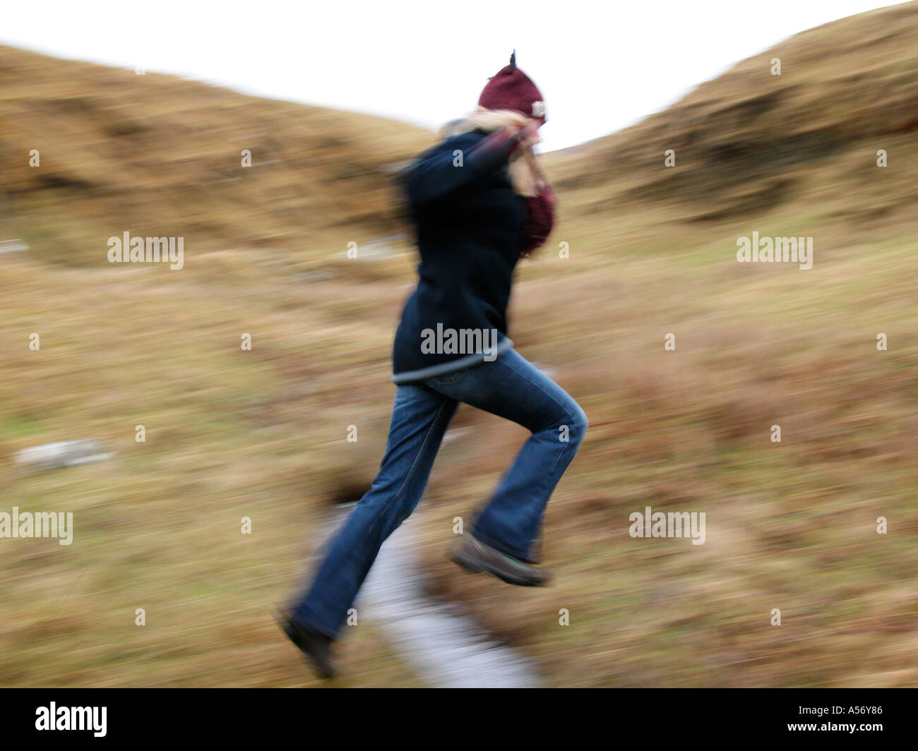 Jumping over Burn Shetland Stock Photo - Alamy