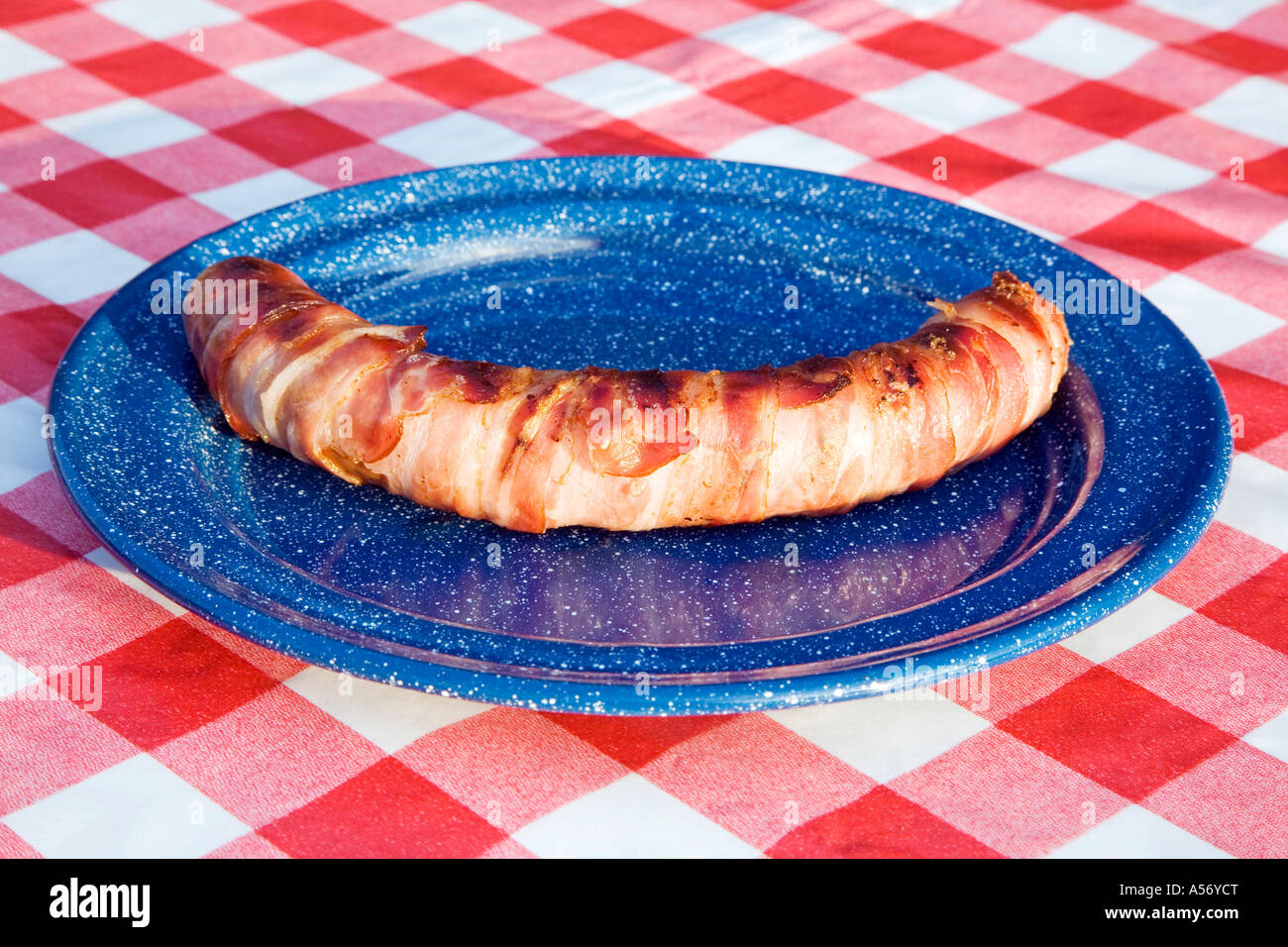 Grilled sausage on metal plate Stock Photo - Alamy