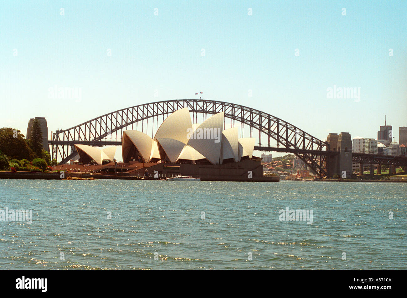 Sydney opera House with the harbour bridge behind by day Stock Photo ...