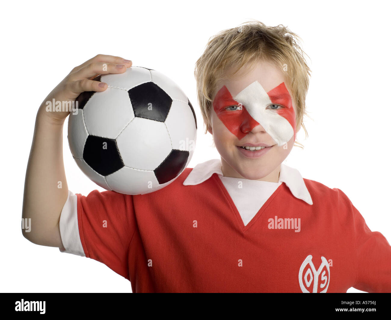 Boy (10-12) holding football on shoulder Stock Photo - Alamy