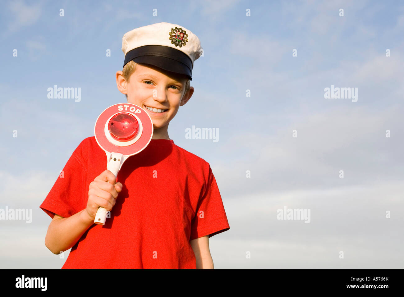 Boy wearing police cap hi-res stock photography and images - Alamy