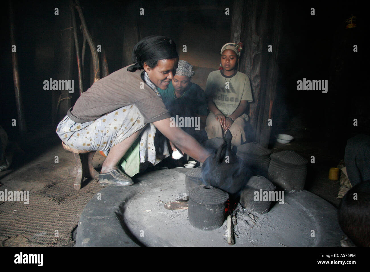 jb1311 ethiopia woman making coffee interior traditional gurage house ...