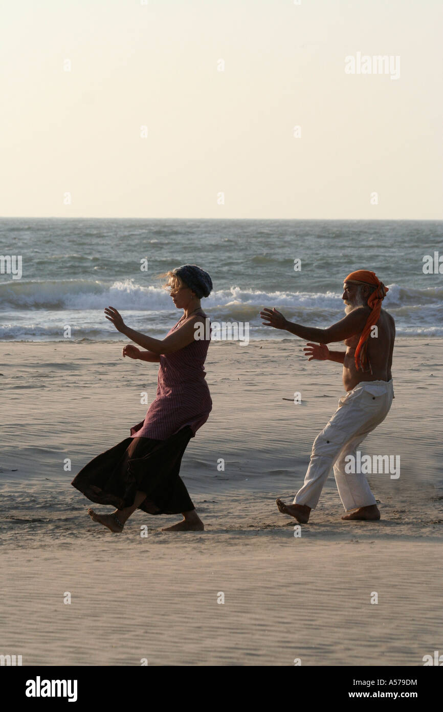 Painet jc3051 india tourists doing tai chi chuan beach arambol goa ...