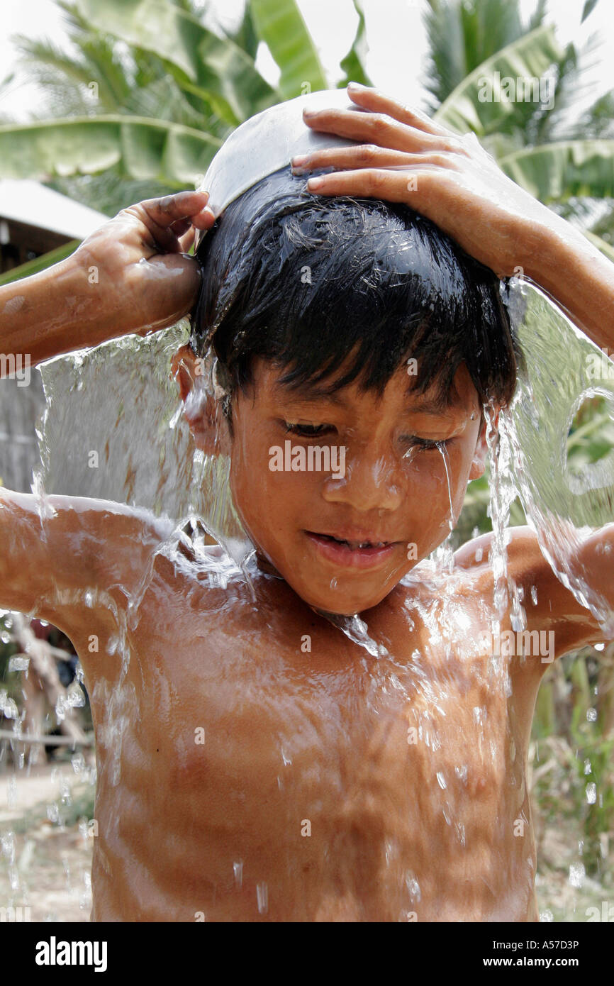 Cambodia kid water hi-res stock photography and images - Alamy