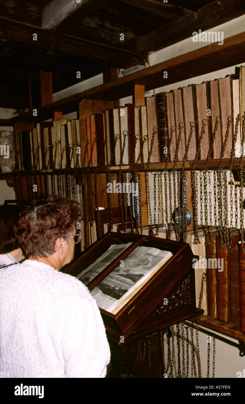 UK Dorset Wimborne Minster visitors in the chained library Stock Photo ...
