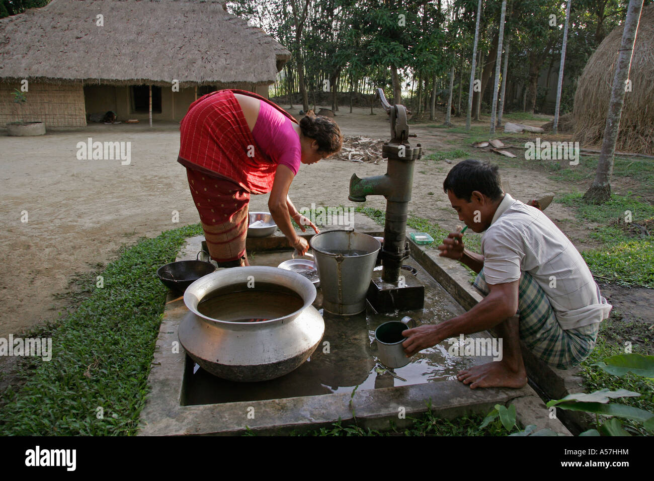 jf5266 bangladesh early morning ablutions garo tribal minority family ...