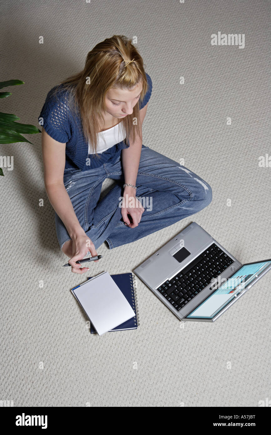 Young woman getting information on computer Stock Photo - Alamy