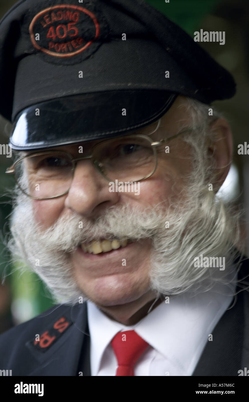 Ticket inspector with grey side whiskers or sideburns and Moustache on ...