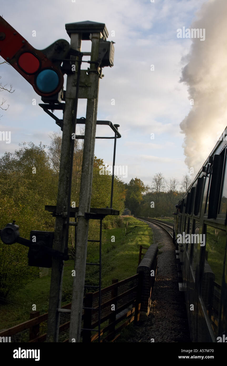 Signals with steam engine train on The Bluebell Railway Sussex England ...