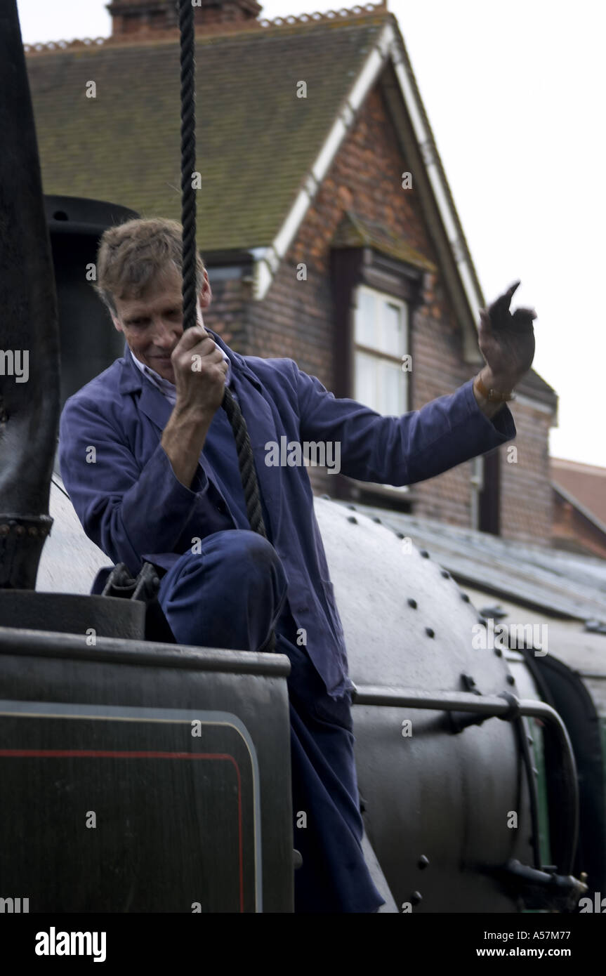 Man on steam engine railway tracks hi-res stock photography and images ...