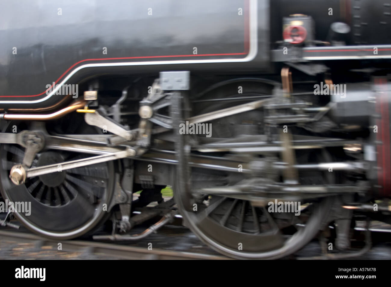 Speeding wheels of the 80151 steam engine on The Bluebell Railway ...