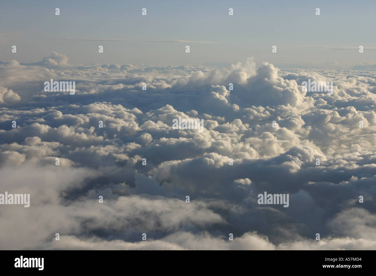Aerial scenic view of clouds below and blue skys from the air Stock ...