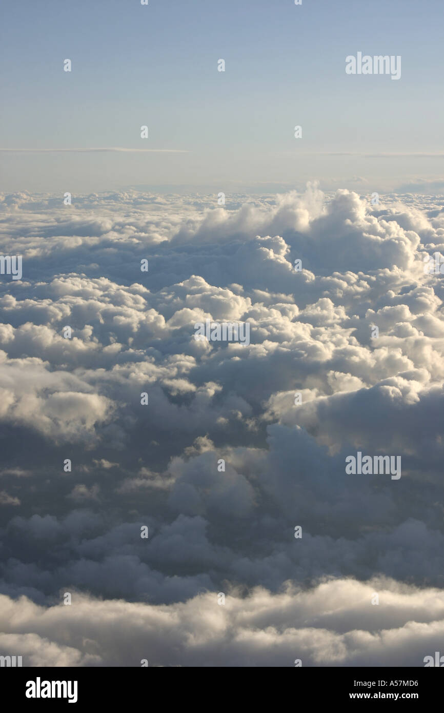 Aerial scenic view of clouds below and blue skys from the air Stock ...