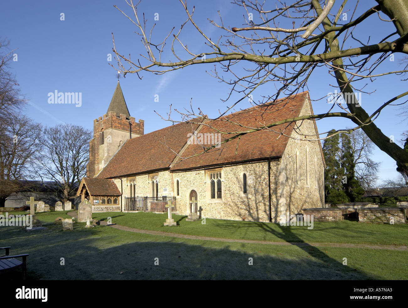 All Saints Old medieval church on a frosty winter morning in High Laver ...