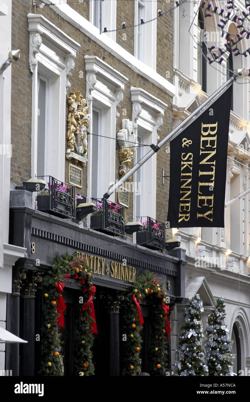 Bentley and Skinner shop front and logo sign and flag Old Bond Street ...