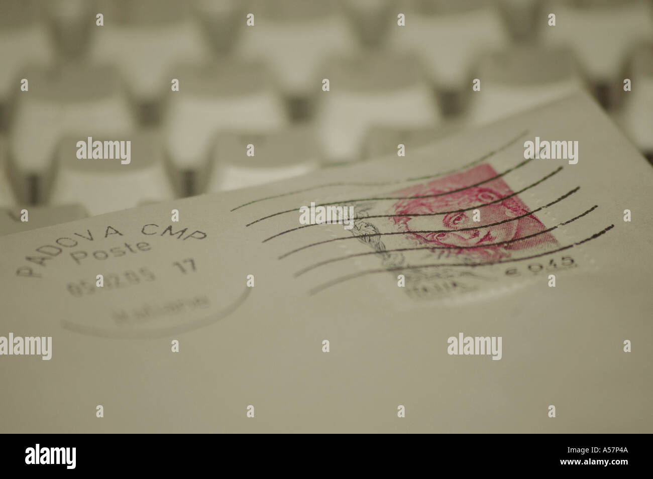 A traditional mail over computer keyboard Stock Photo - Alamy