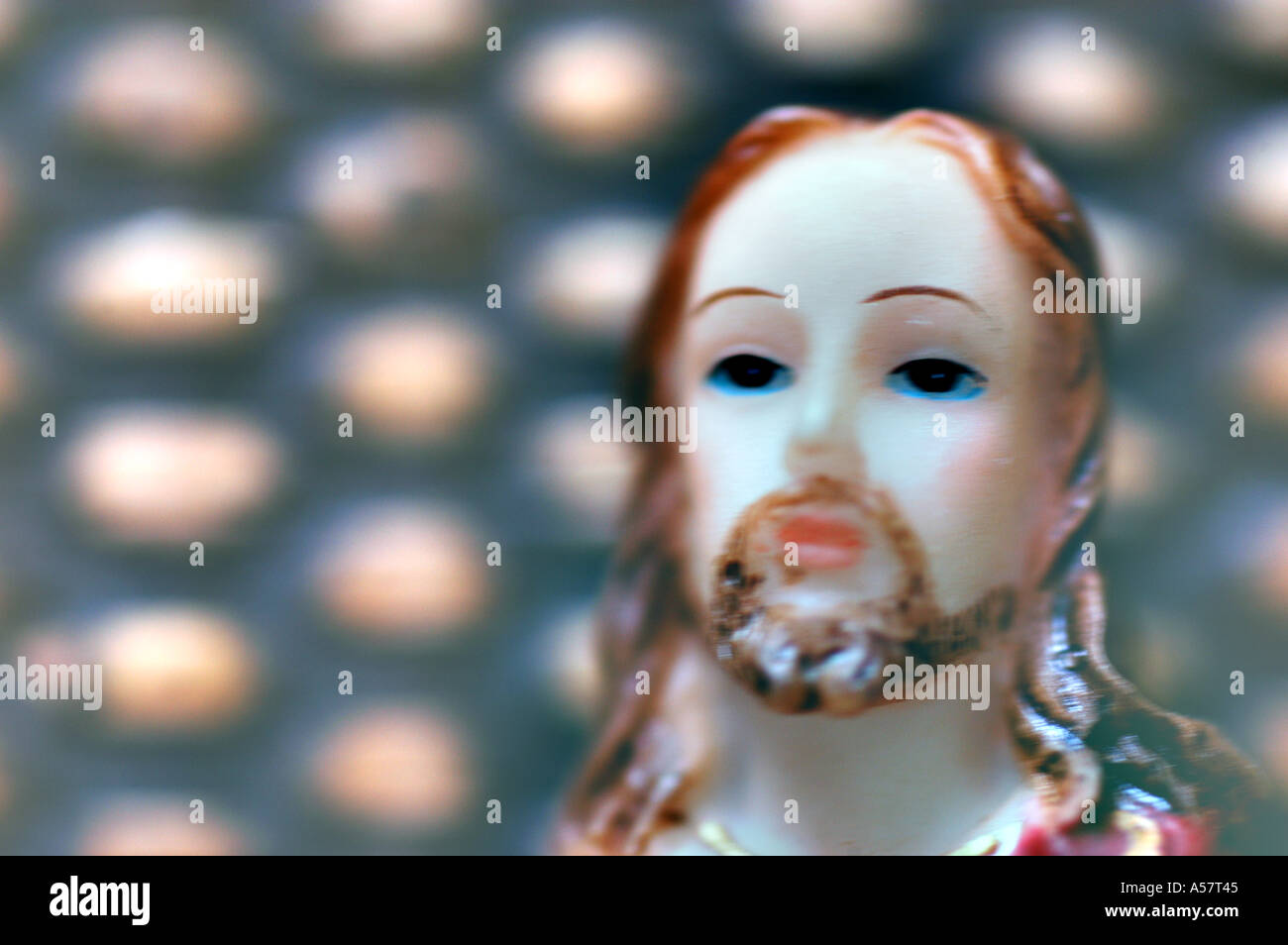 Plastic Jesus Icon on contemporary background Stock Photo - Alamy