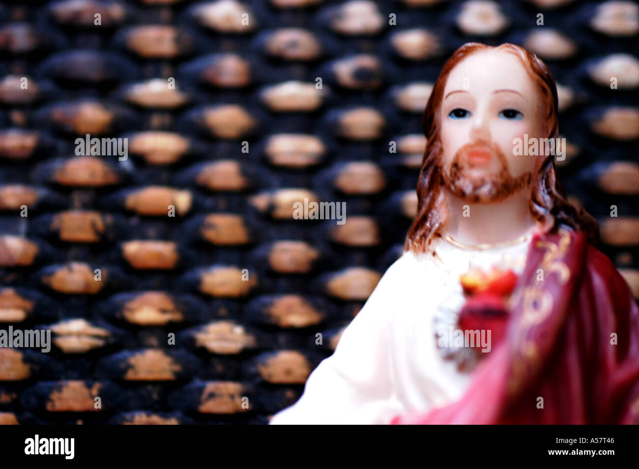 Plastic Jesus Icon on contemporary background Stock Photo - Alamy