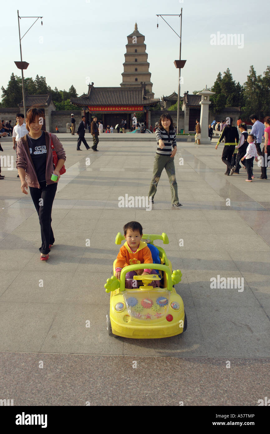 Painet jf5551 china boy riding toy car front little goose pagoda xian ...