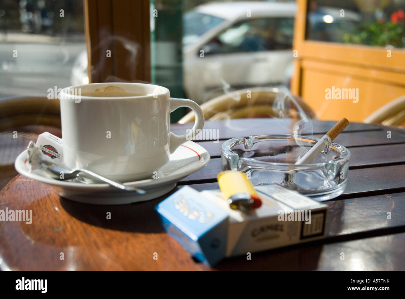 Paris cafe smoking hi-res stock photography and images - Alamy