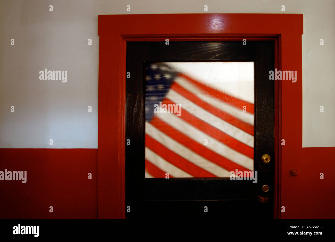 American flag in window Stock Photo - Alamy