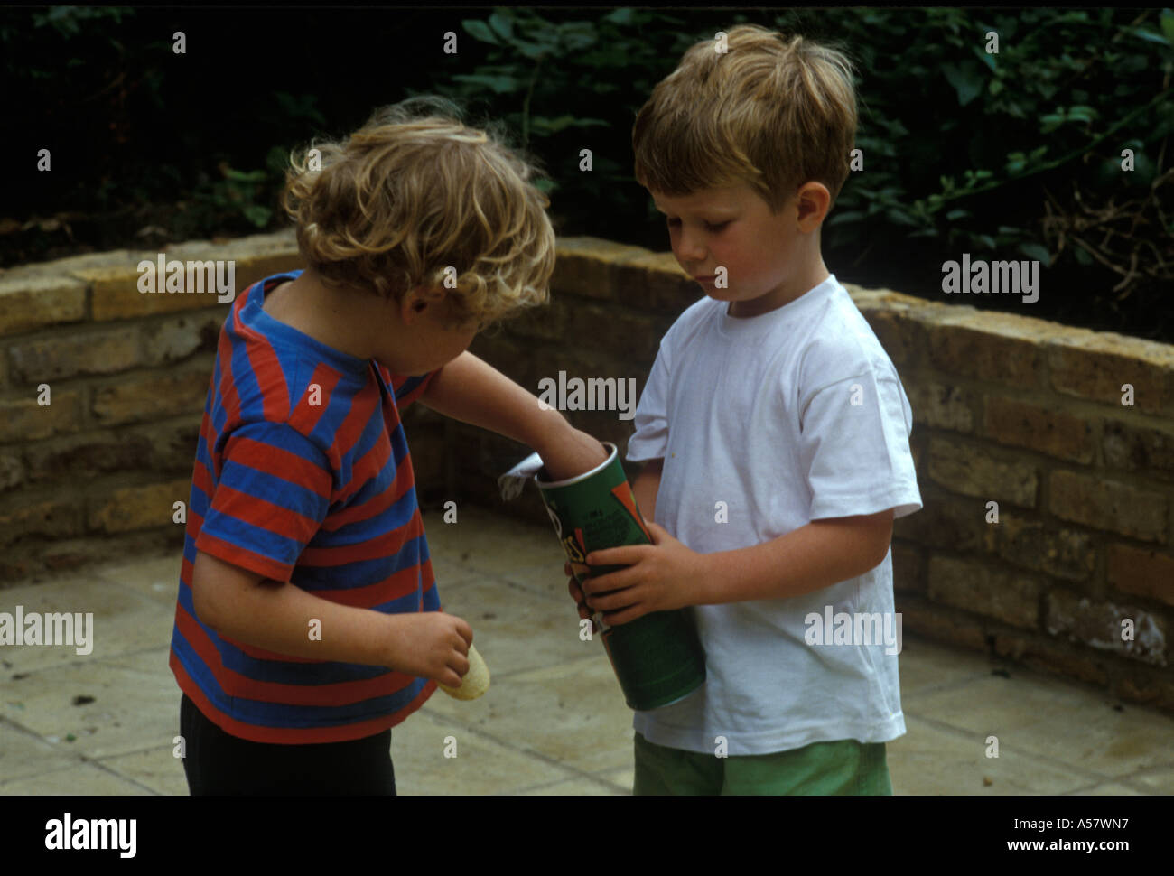 Toddlers learning to share hi-res stock photography and images - Alamy