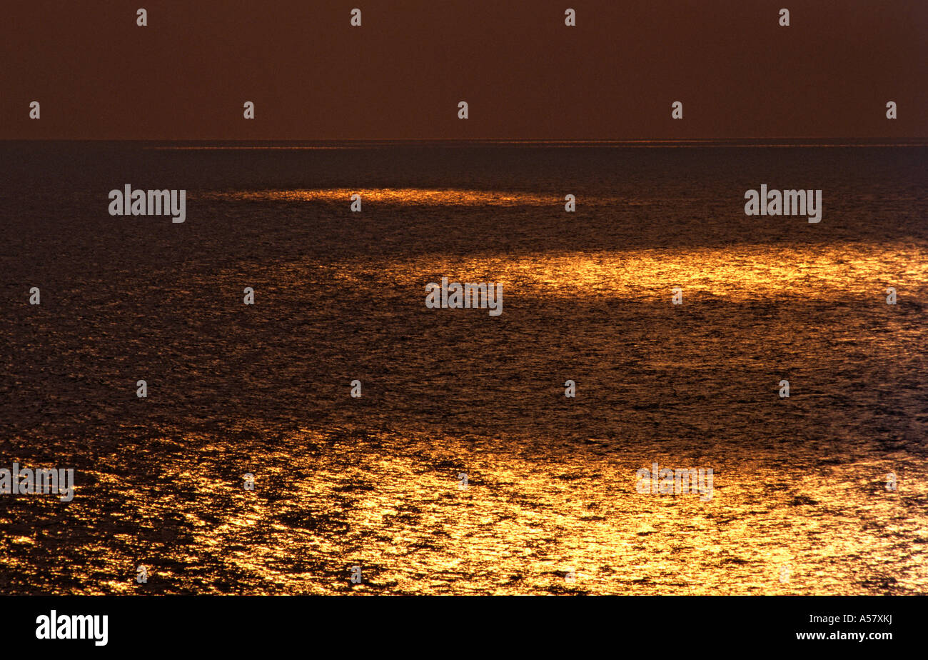 Sun light beams on ocean Stock Photo - Alamy