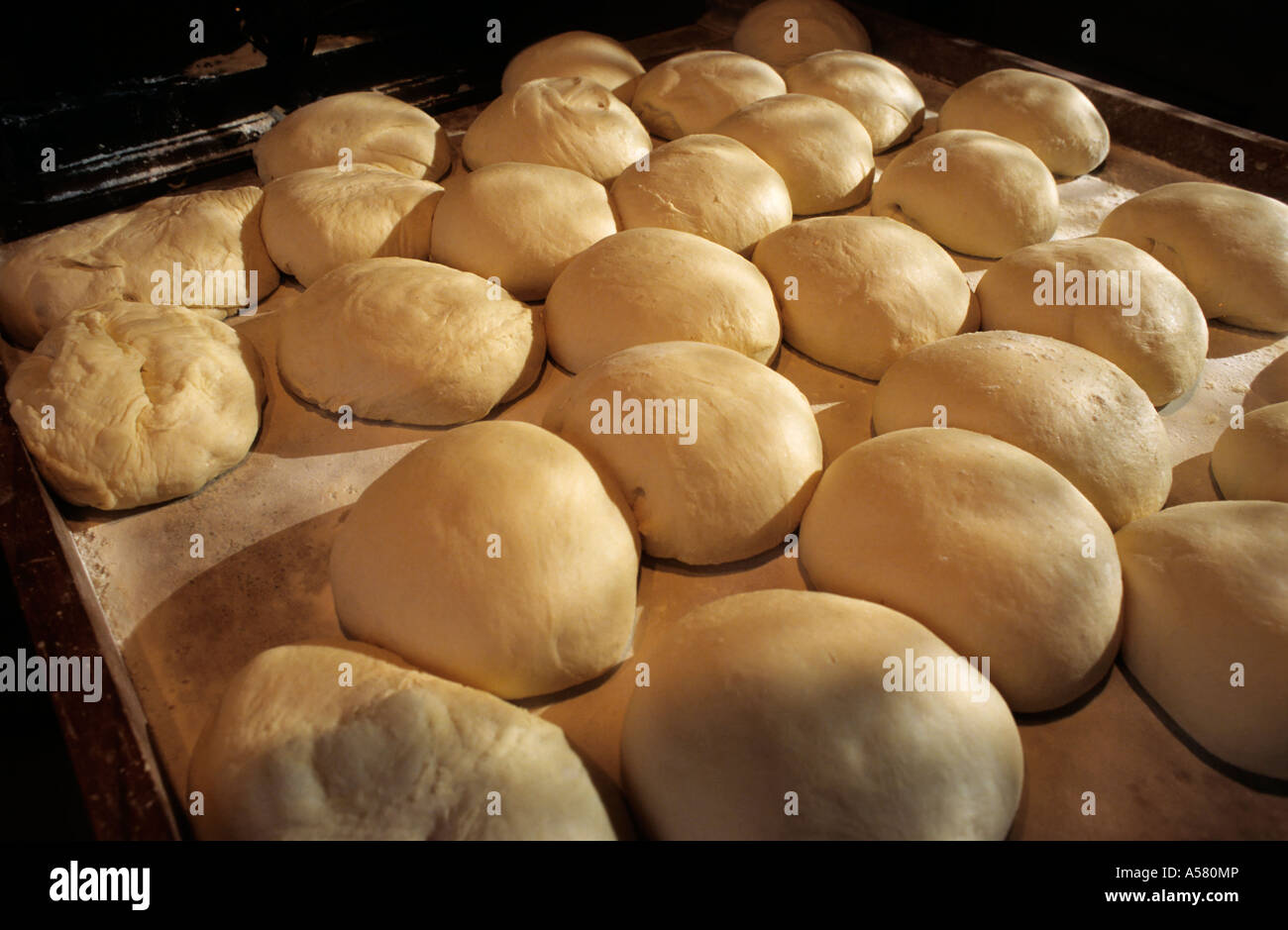 Bread dough resting in preparation of being cooked in a bakery, France ...
