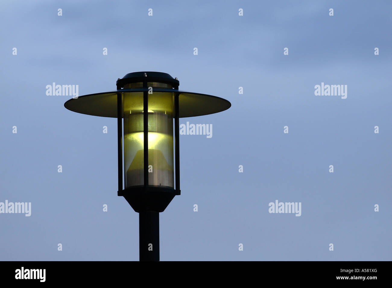 Burning street lamp Stock Photo - Alamy