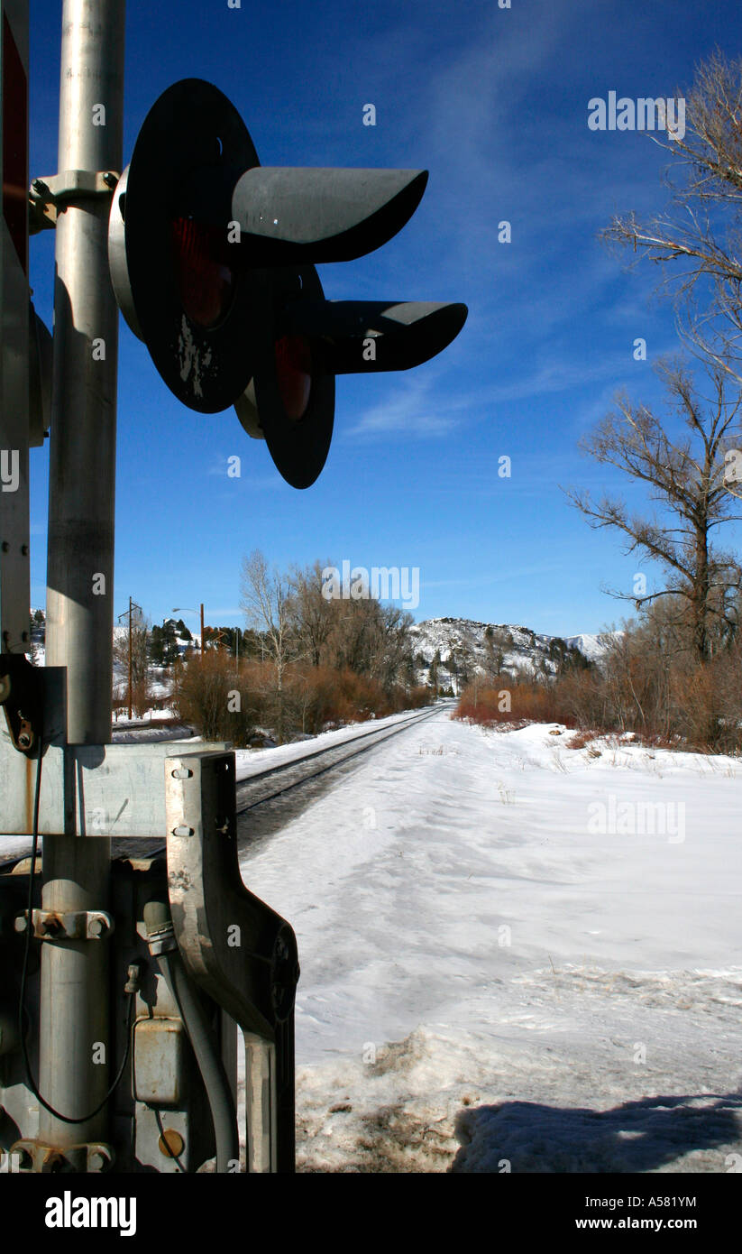 level crossing and railway lines through the snow, Steamboat, colorado ...