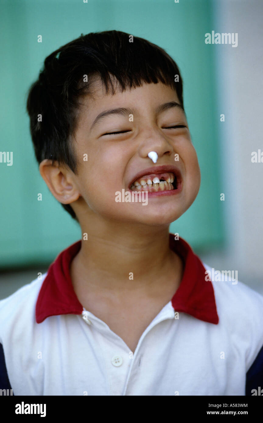 Six year old boy with a missing tooth making a silly face, France Stock Photo - Alamy