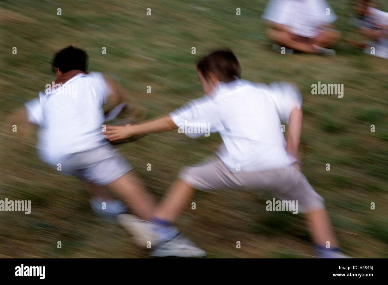 Two Blurred Boys Playing Stock Photo - Alamy