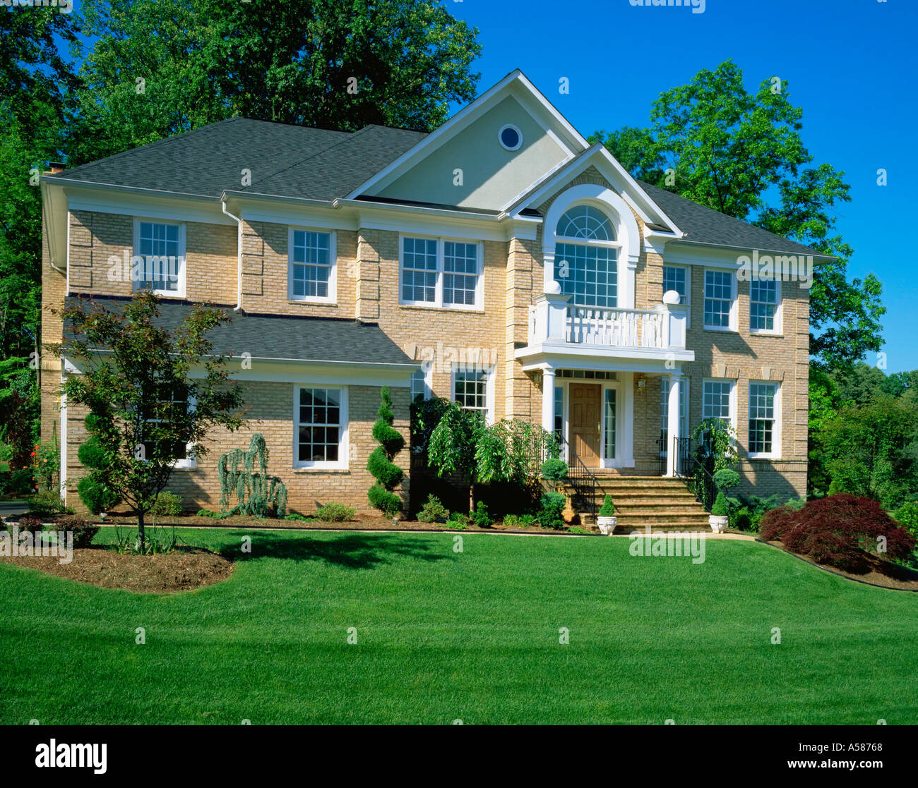 Exterior view of large multi story brick house Property released Stock ...