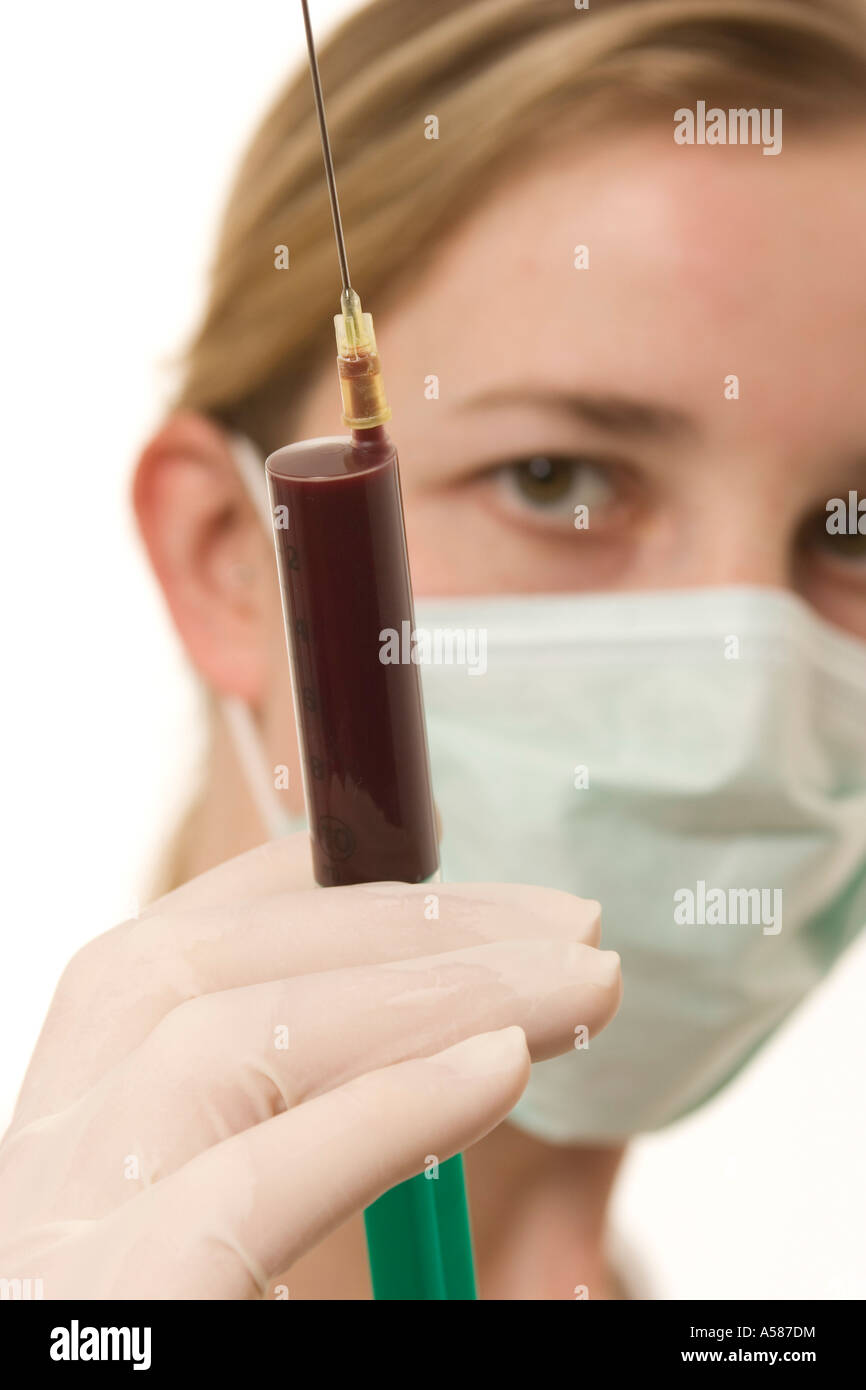 Lab assistant with injection Stock Photo - Alamy