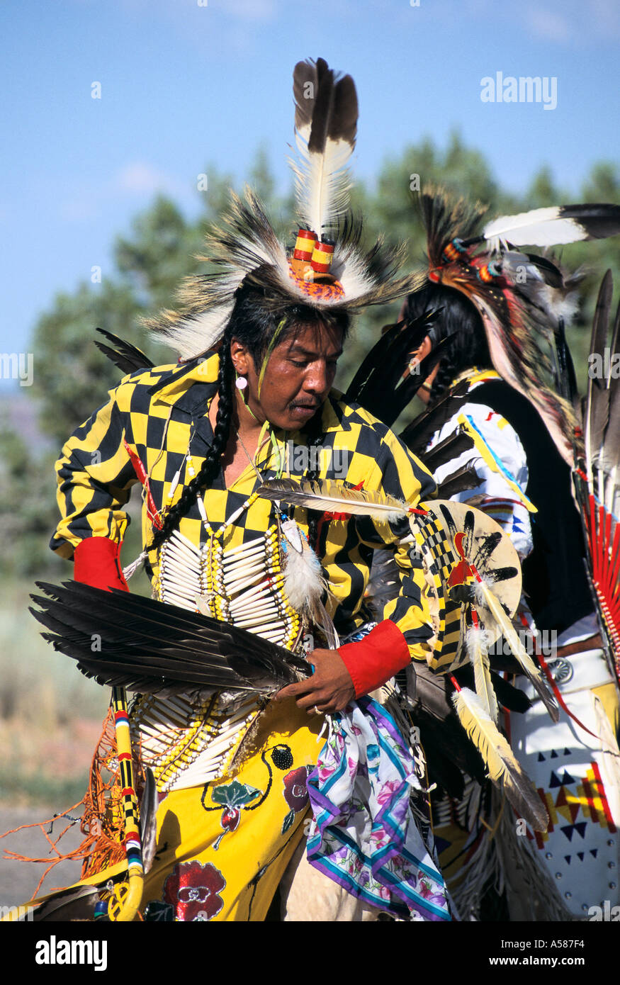Pair of elaborately dressed Navajo dancers outdoors Cedar City Utah ...