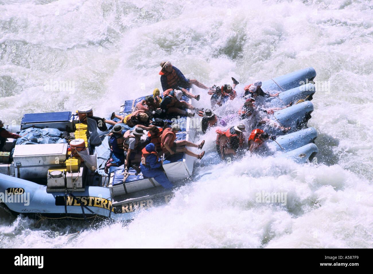 Rafters cling onto Western Rivers boat riding the frothing rapids of ...