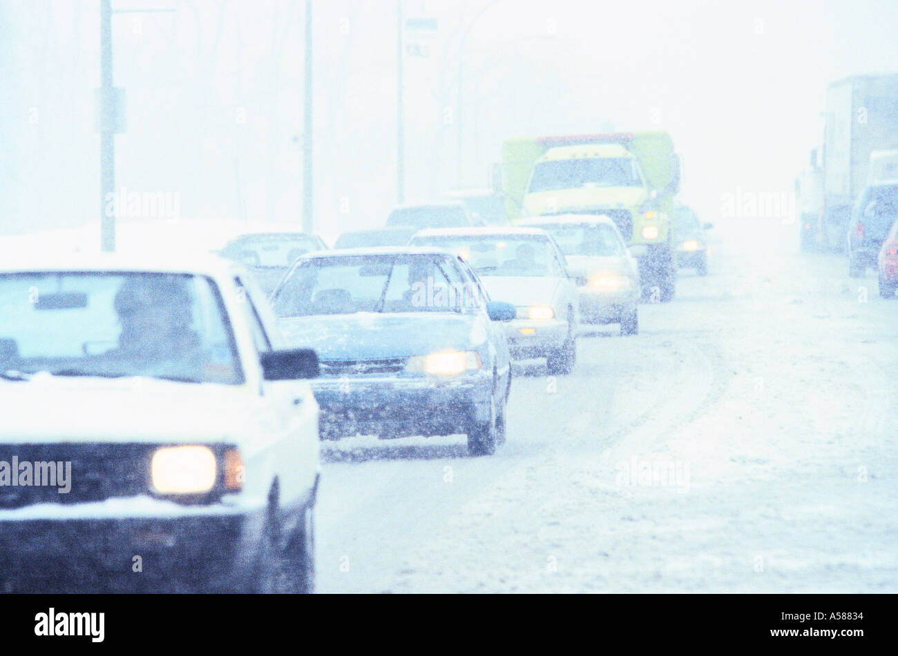 Traffic jam of cars and trucks caught in winter storm Stock Photo - Alamy