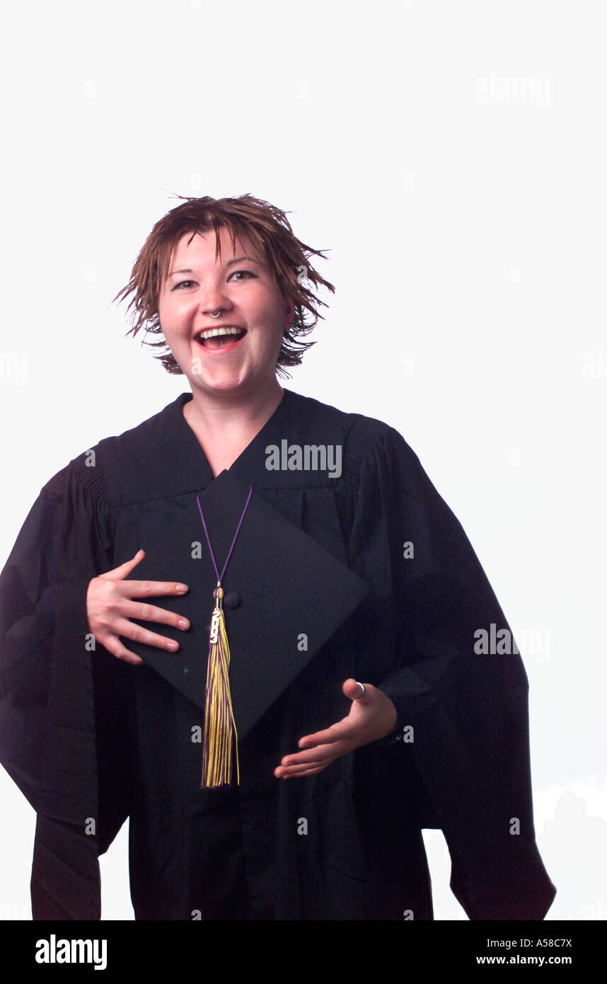 Portrait of a recent graduate in cap and gown Stock Photo - Alamy