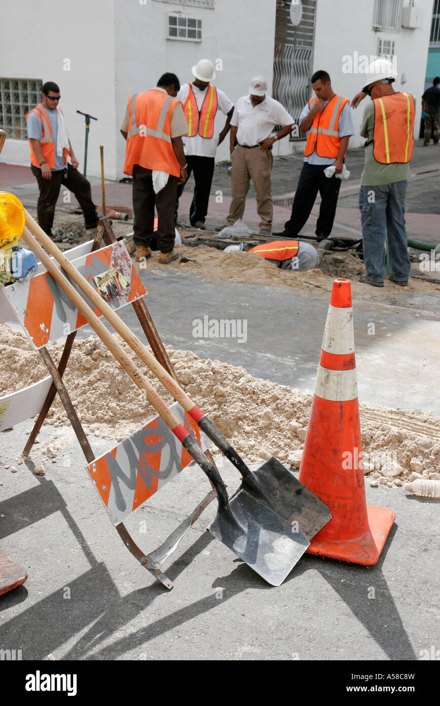 Miami Beach Florida,city street repair,fix,workers,shovels,digging ...