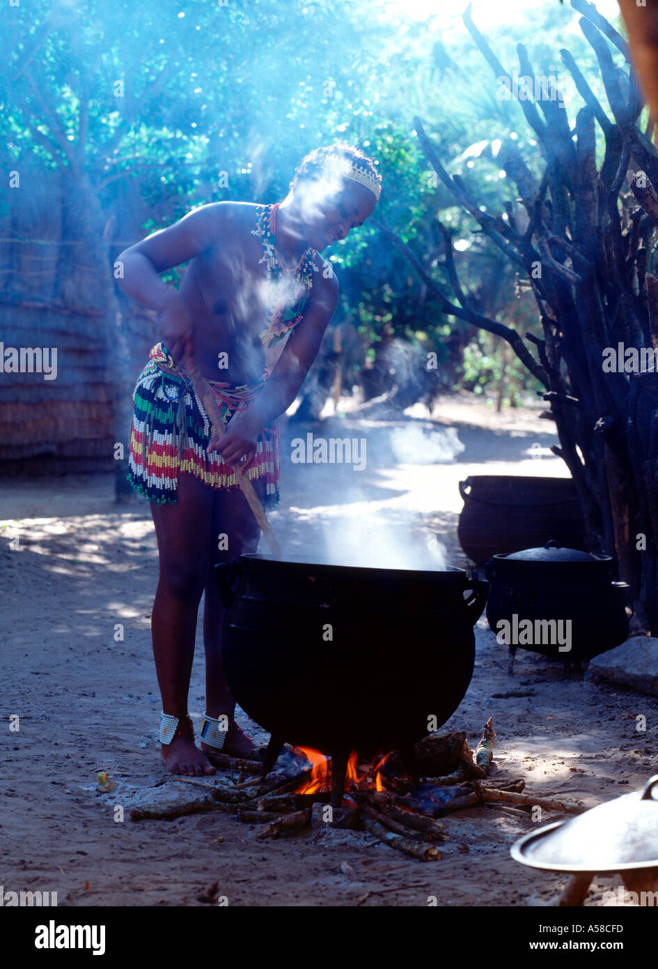 Zulu woman cooking hi-res stock photography and images - Alamy