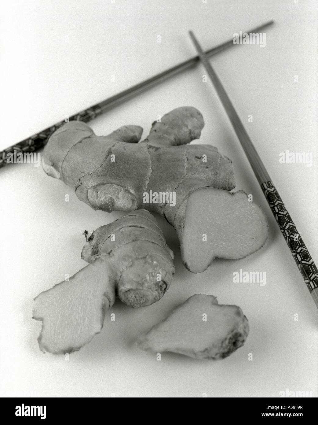 Sliced ginger root on black hi-res stock photography and images - Alamy