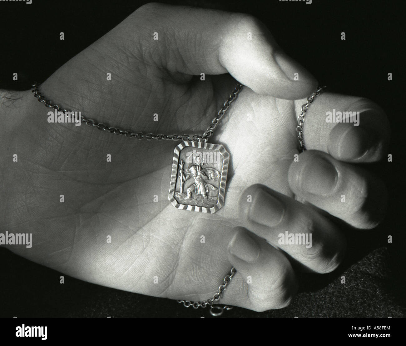 St christopher necklace hi-res stock photography and images - Alamy