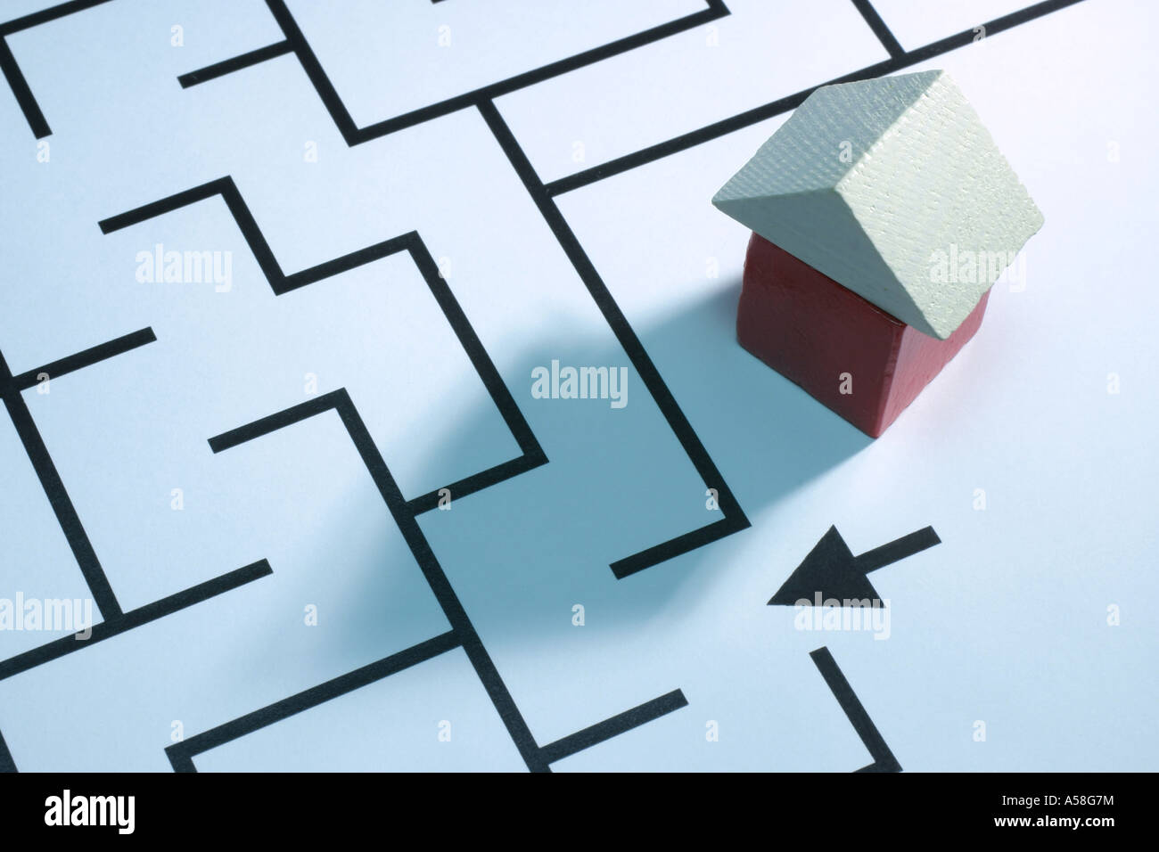 Miniature House on Maze Stock Photo - Alamy