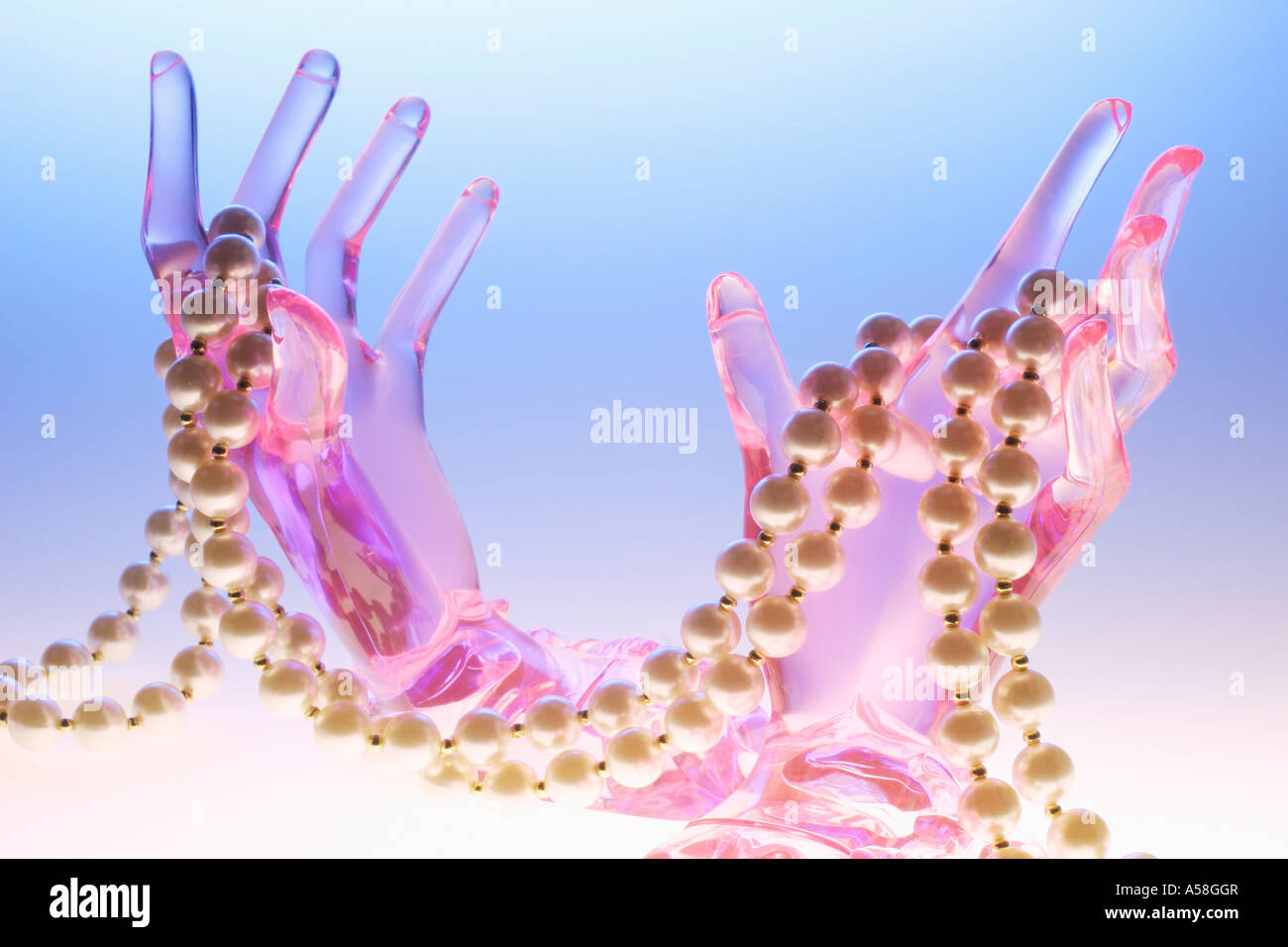 Pearl Necklace on Hand Displays Stock Photo - Alamy