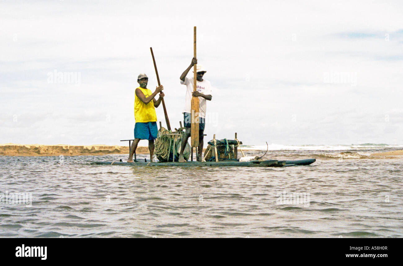 Two brazilian fisherman on raft returning from fishing trip Stock Photo ...