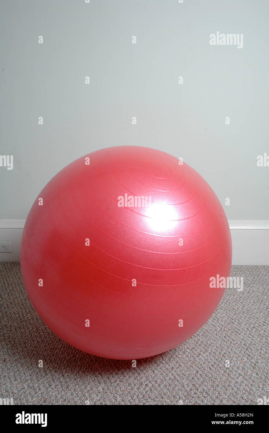 Red Pilates Ball Stock Photo - Alamy