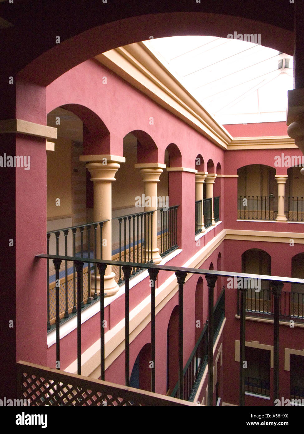 An atrium in a modern Spanish hotel inspired by Andalusian Moorish ...